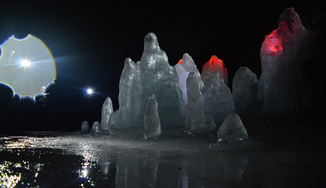 Lofthellir Ice Cave: A Gay Couple discovering ice stalagmites & stalactites