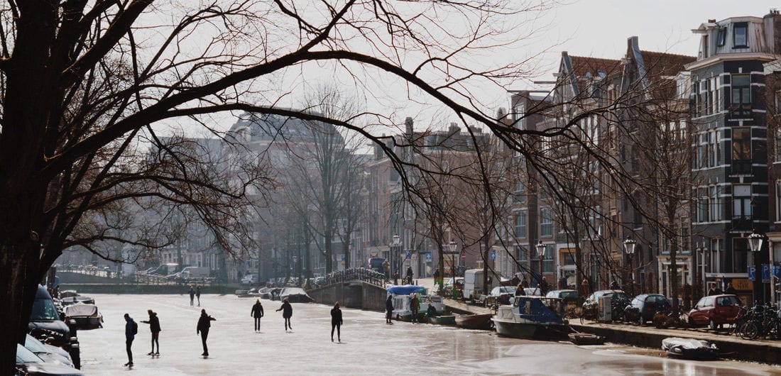 Amsterdam's Frozen Canals - Ice Skating on Grachten in Winter