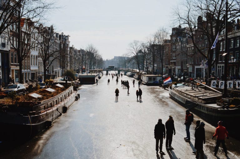 Amsterdam's Frozen Canals - Ice Skating on Grachten in Winter